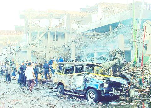 187 die, 300 more hurt by Bali bomb - Taipei Times