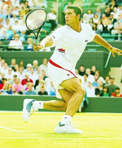 Unseeded Philippoussis upsets Agassi - Taipei Times