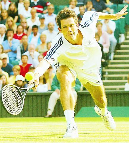 Unseeded Philippoussis upsets Agassi - Taipei Times