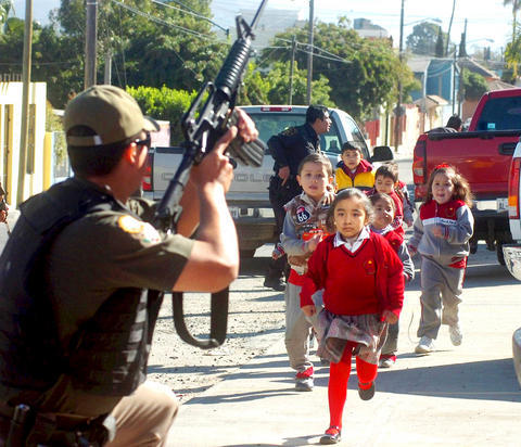 Drug gangs break code, kill kids - Taipei Times