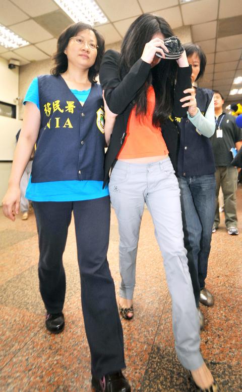 Agents Police Raid Offices Of Alleged Prostitution Ring Taipei Times