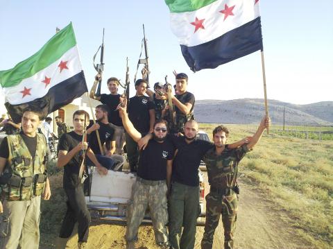 Libyan fighters join Syrian rebels’ revolt - Taipei Times