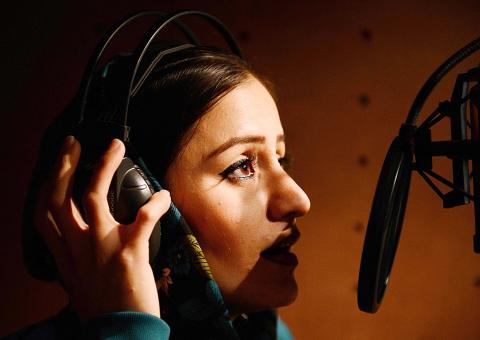 Afghan female rapper seeks reason with rhymes - Taipei Times