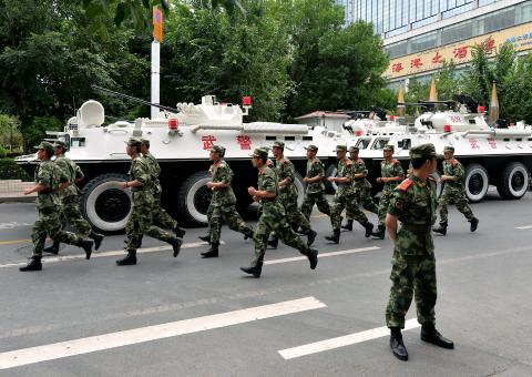 Violence hits west China ahead of key anniversary - Taipei Times