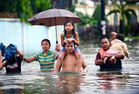 Torrential rains flood half of Metro Manila - Taipei Times