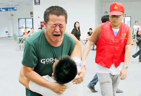 Chinese factory death toll hits 75 - Taipei Times