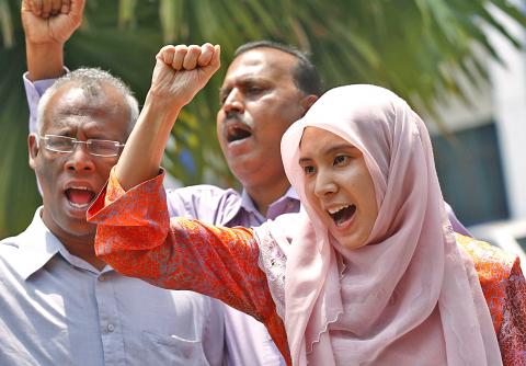 Malaysian police release Anwar’s daughter on bail - Taipei Times