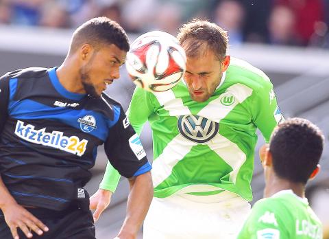 Dost fires Wolfsburg to Champions League - Taipei Times