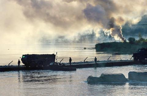 Kremlin accuses NATO of border encroachment - Taipei Times
