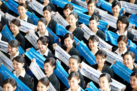 Thousands join Japan workforce - Taipei Times