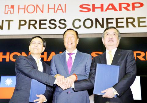 Hon Hai, Sharp sign deal after four-year drama - Taipei Times