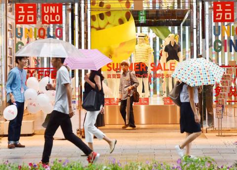 Fast Retailing shares surge by daily limit as yen gain reverses ...