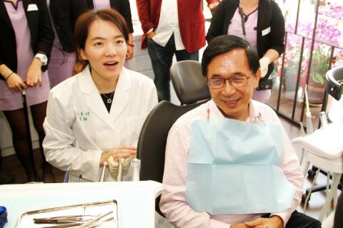Ex-president speaks at clinic opening - Taipei Times