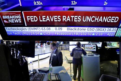US Federal Reserve leaves interest rates unchanged, remains upbeat on ...