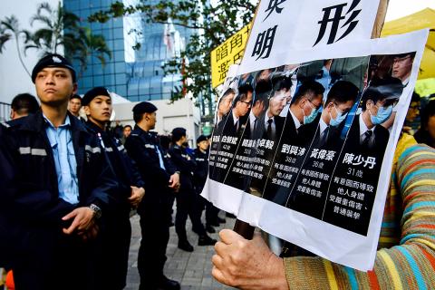 Seven HK police officers jailed for activist’s beating - Taipei Times