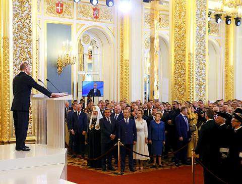 Putin sworn in for fourth term - Taipei Times