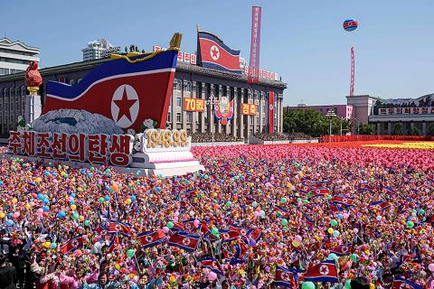 Floats, flowers in N Korean parade - Taipei Times