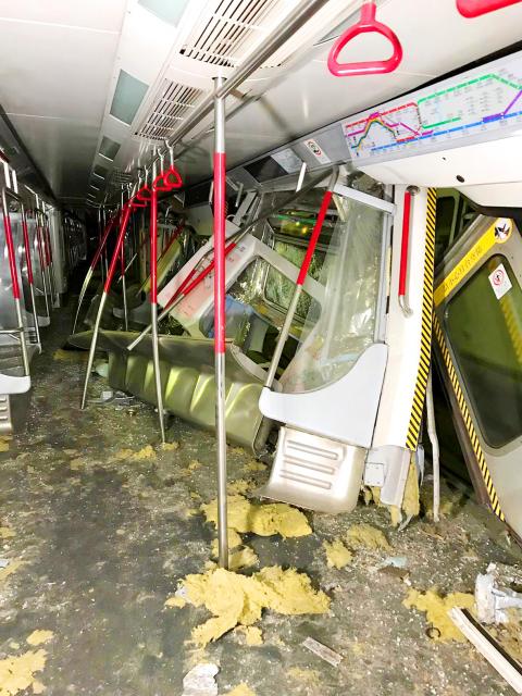 HK subway trains collide during signal system tests - Taipei Times