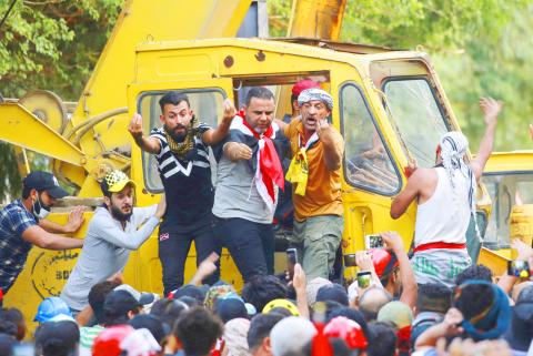 Hollow building becomes center of Iraqi uprising - Taipei Times