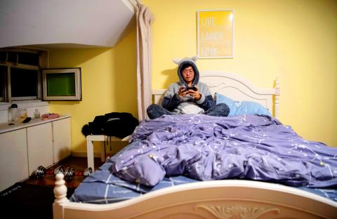 ‘Virtual boyfriends’ a match for China’s young, single women - Taipei Times