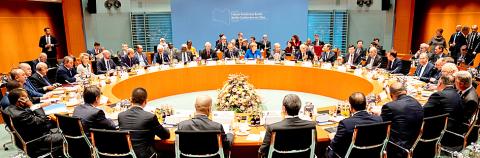 Merkel hosts Libya summit in bid to halt proxy fighting - Taipei Times