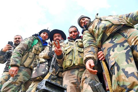 Syrian troops capture key rebel town - Taipei Times