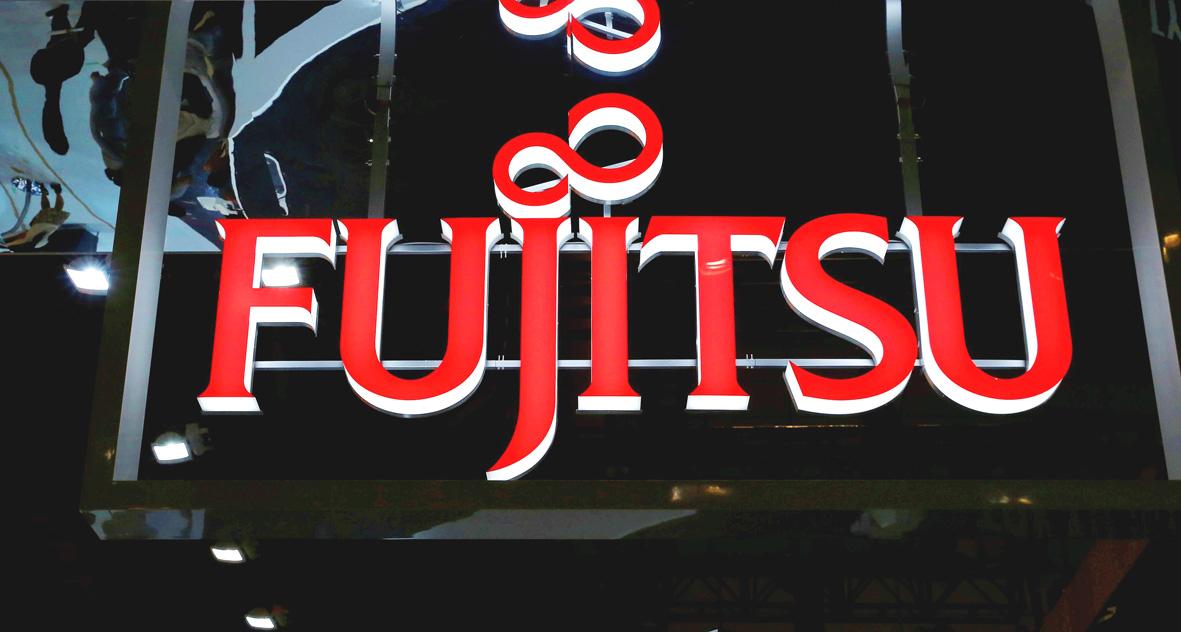 Fujitsu plans to cut office space by half - Taipei Times