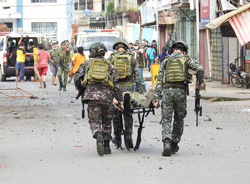 Philippine bombing kills 10 - Taipei Times