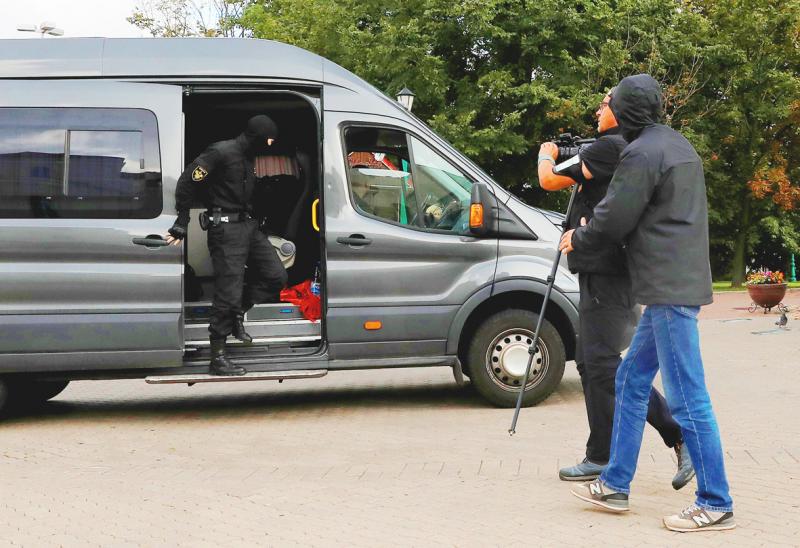 Putin says Russia ready to provide Belarus security - Taipei Times