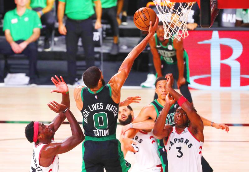 Celtics beat Raptors to advance - Taipei Times