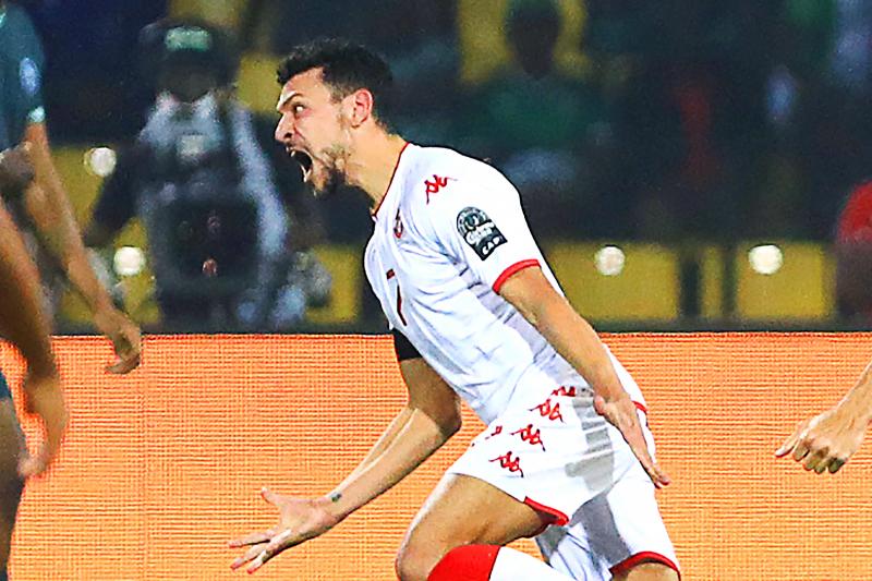 Msakni fires Tunisia to last eight - Taipei Times