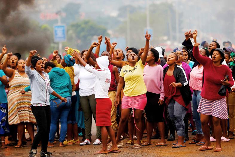 S Africans seek ‘solace’ on Easter amid fatal flooding - Taipei Times