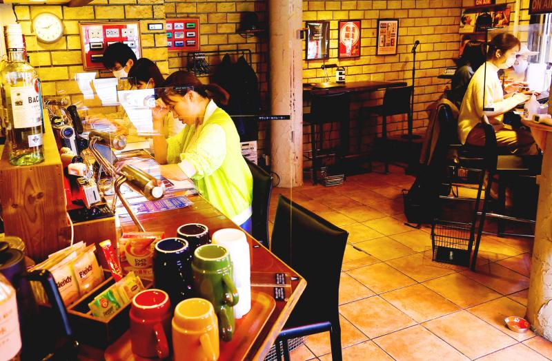 Coffee, tea and nagging at a Tokyo cafe for writers striving to meet a ...