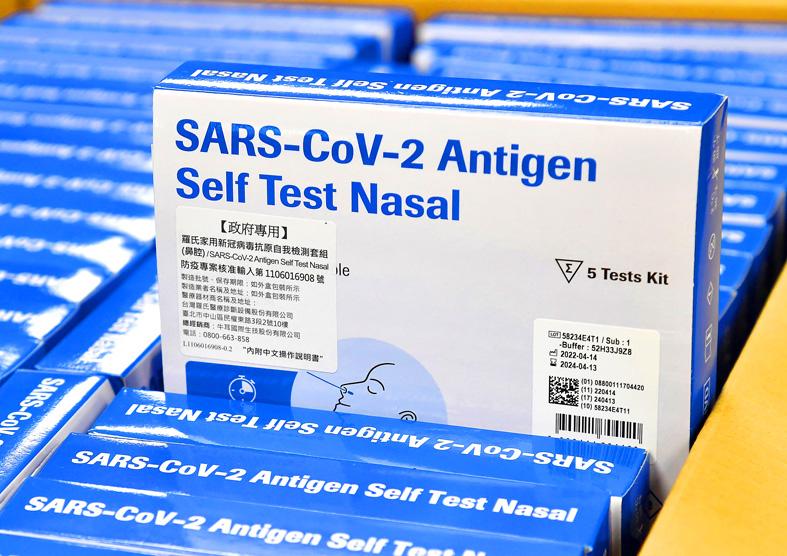 COVID-19: Rationing for virus test kits launched - Taipei Times