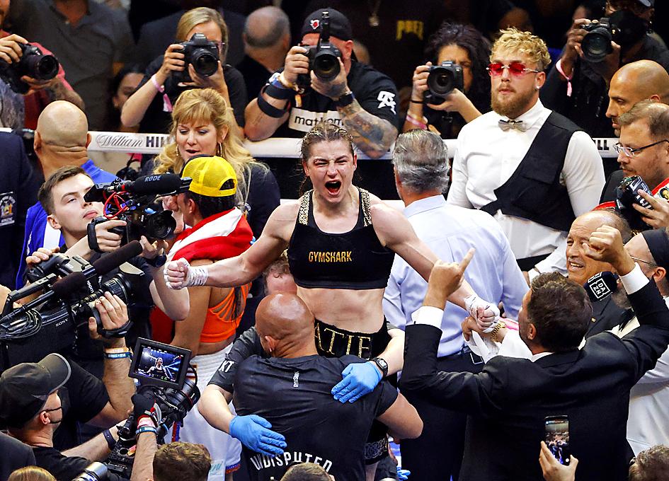 Taylor edges Serrano in historic fight - Taipei Times