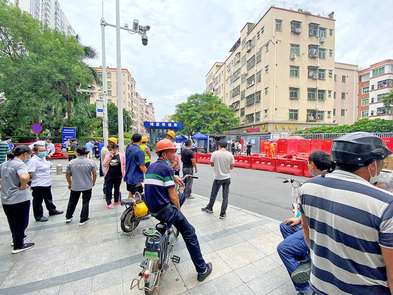 China factory activity slows amid curbs - Taipei Times