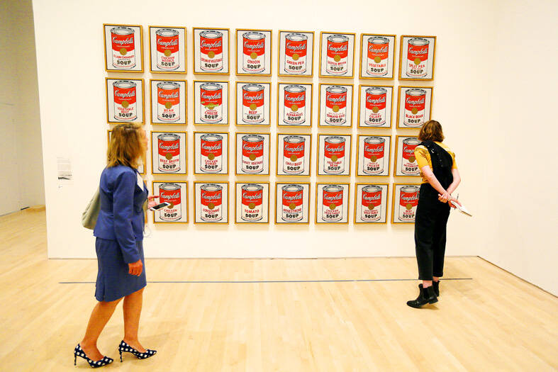 Australian protesters glue hands to Warhol prints - Taipei Times