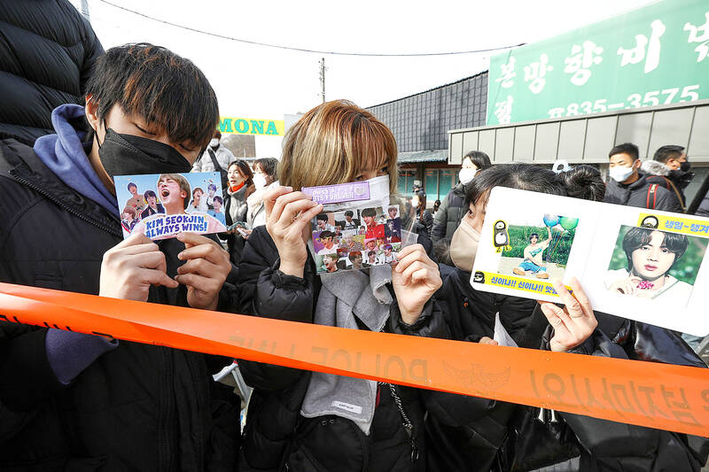 BTS star Jin begins military service in S Korea - Taipei Times