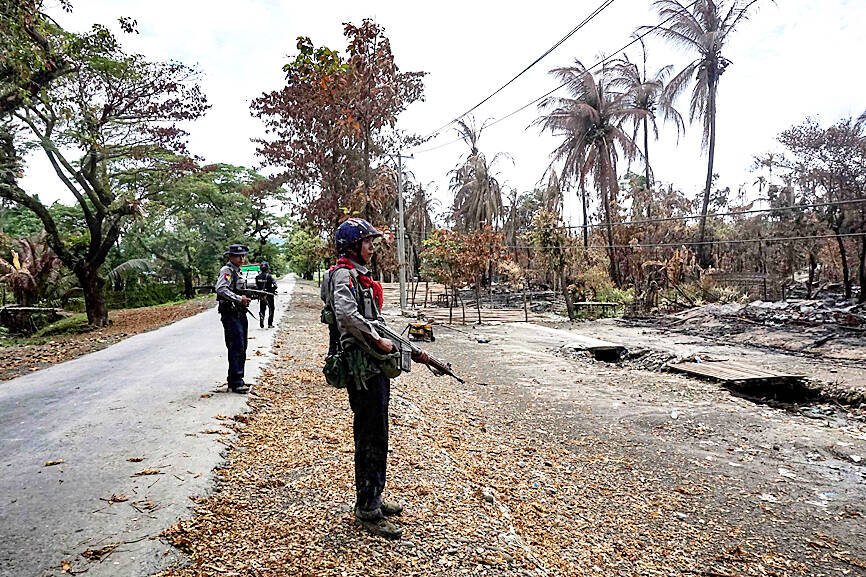 Myanmar police nabs 12 linked to Rohingya deaths - Taipei Times