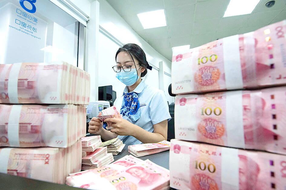 China cuts key interest rate to stimulate economy - Taipei Times
