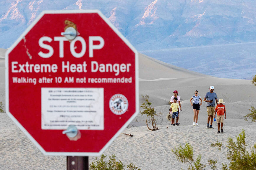 Record heat waves sweep the world - Taipei Times