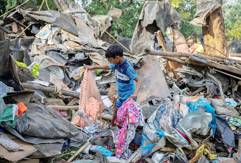 Many slums disappear from Delhi ahead of G20 meet - Taipei Times