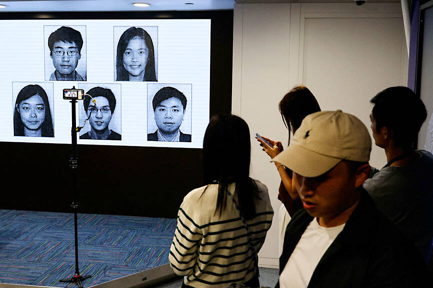 HK defends its order to arrest US, UK dissidents - Taipei Times