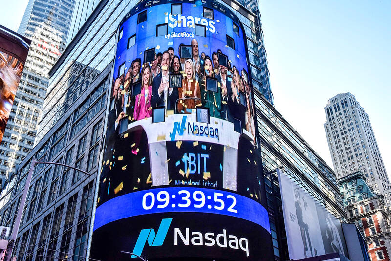 Bitcoin ETFs top US$4.6bn on first US trading day - Taipei Times