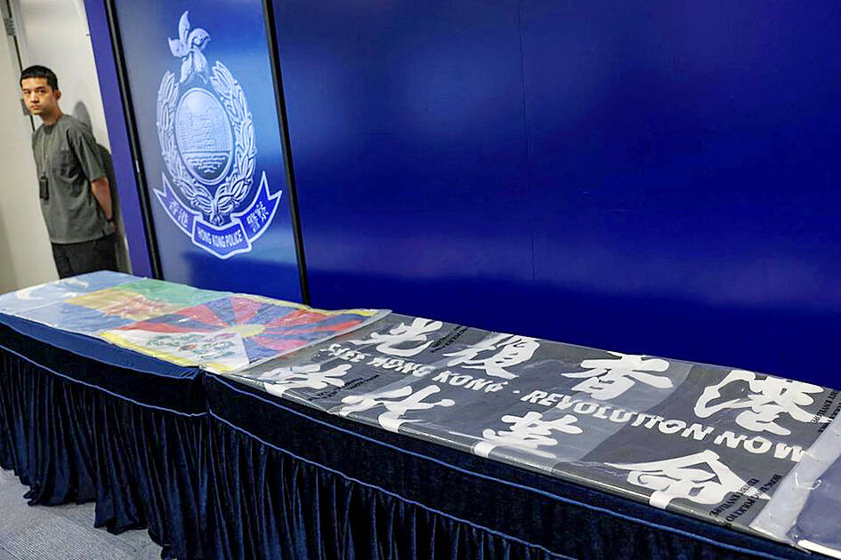 Teen among 4 arrested for subversion in Hong Kong - Taipei Times